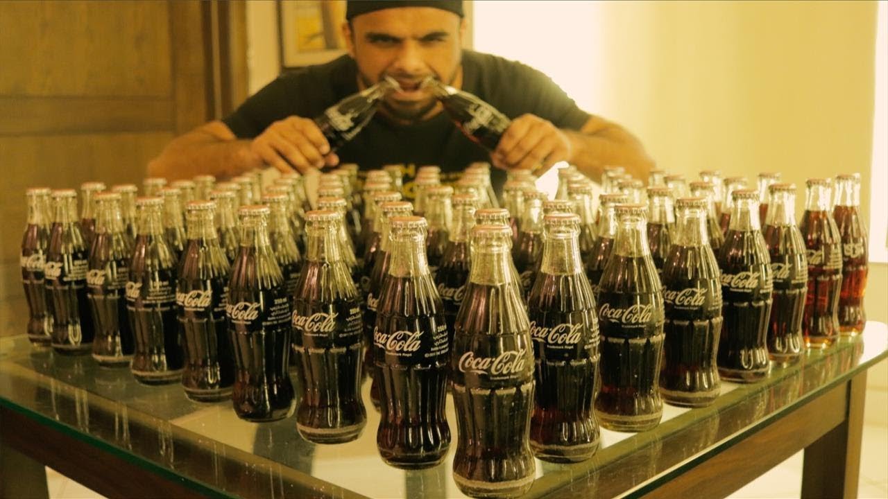 I Opened 100 Bottles Of Coke With My Mouth In 5 Minutes. - YouTube
