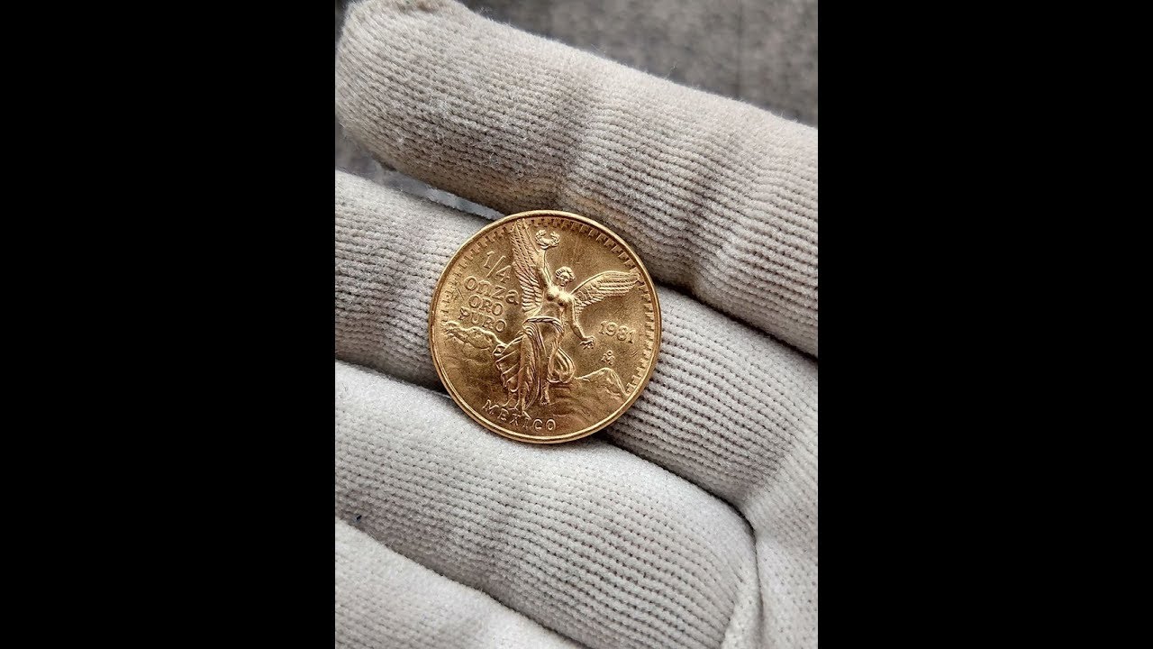La onza de oro libertad. Moneda de oro puro. - YouTube