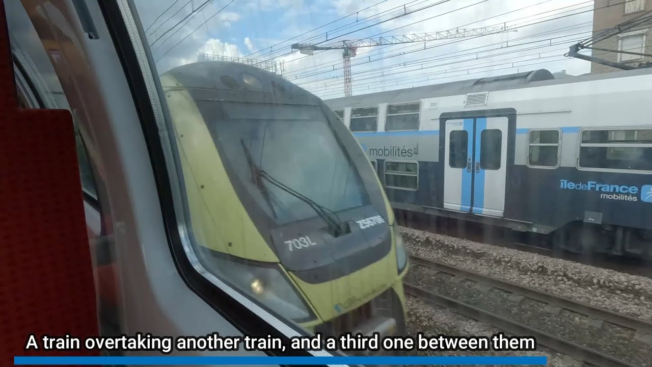 Train overtaking another train, and a third between them at 1.34 - YouTube