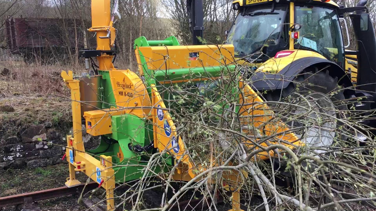 TRAC Engineering - Valtra Tractor with Crane Fed Chipper (2) - YouTube