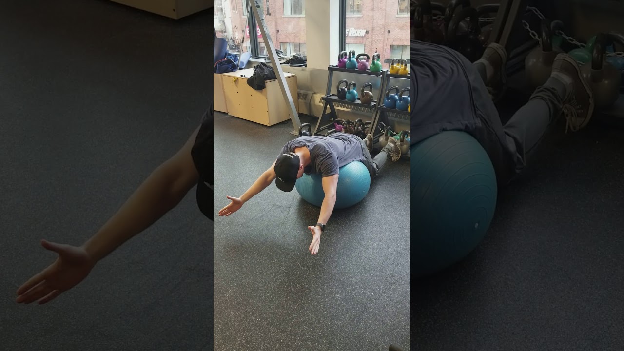 Stability ball back extension with arm Y - YouTube