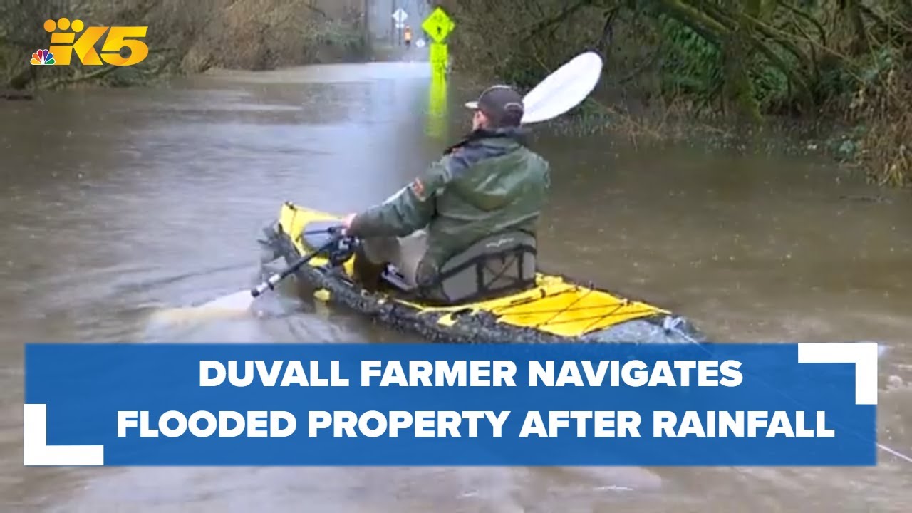Duvall farmer navigates flooded farm after historic rainfall - YouTube