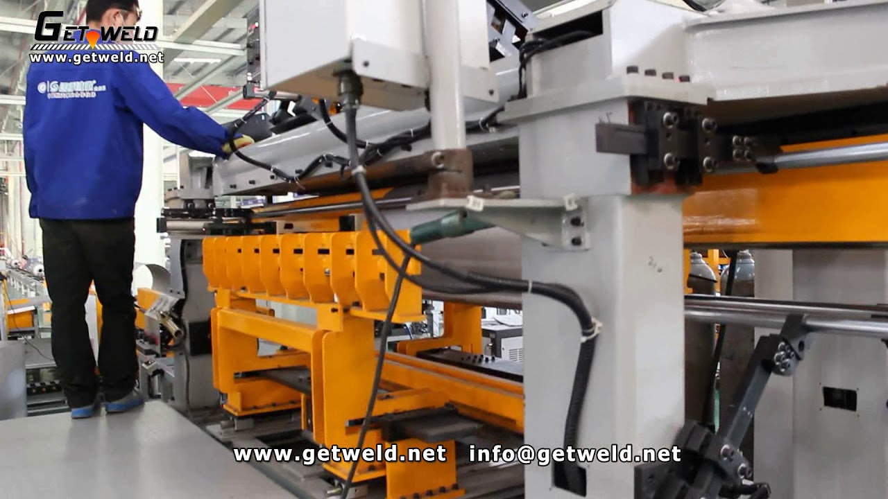 Full automatic pass-through linear welding machine - YouTube