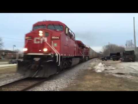CP 8504 passes bye Pewaukee lake - YouTube