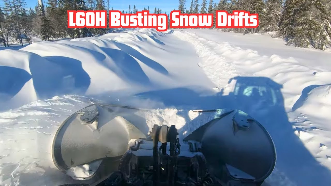 Wheelloader Busting Snow Drifts in Swedish Wind Farm - YouTube