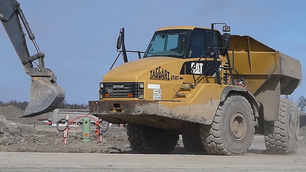 CONSTRUCTION BIG Rock Removal Cat®740 Articulated Dump Truck | John ...