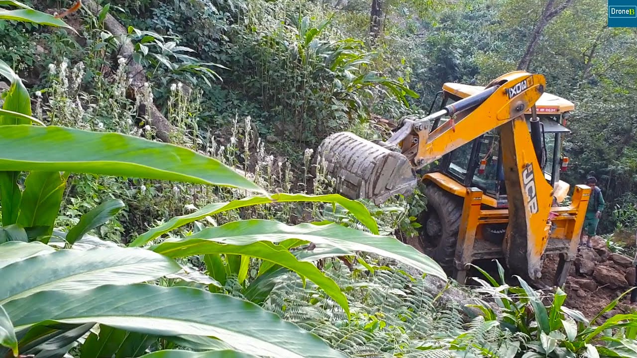 Through Steep Hill and Dense Forest JCB Backhoe Making A New Mountain ...