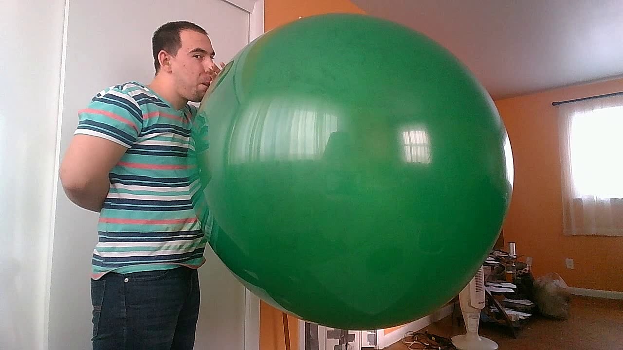 Blow to pop green weather balloon HD - YouTube