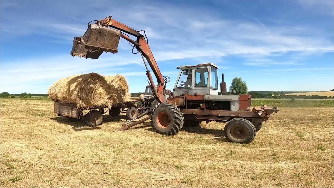 Редки кадры! Карпатец грузит рулоны сена! - YouTube