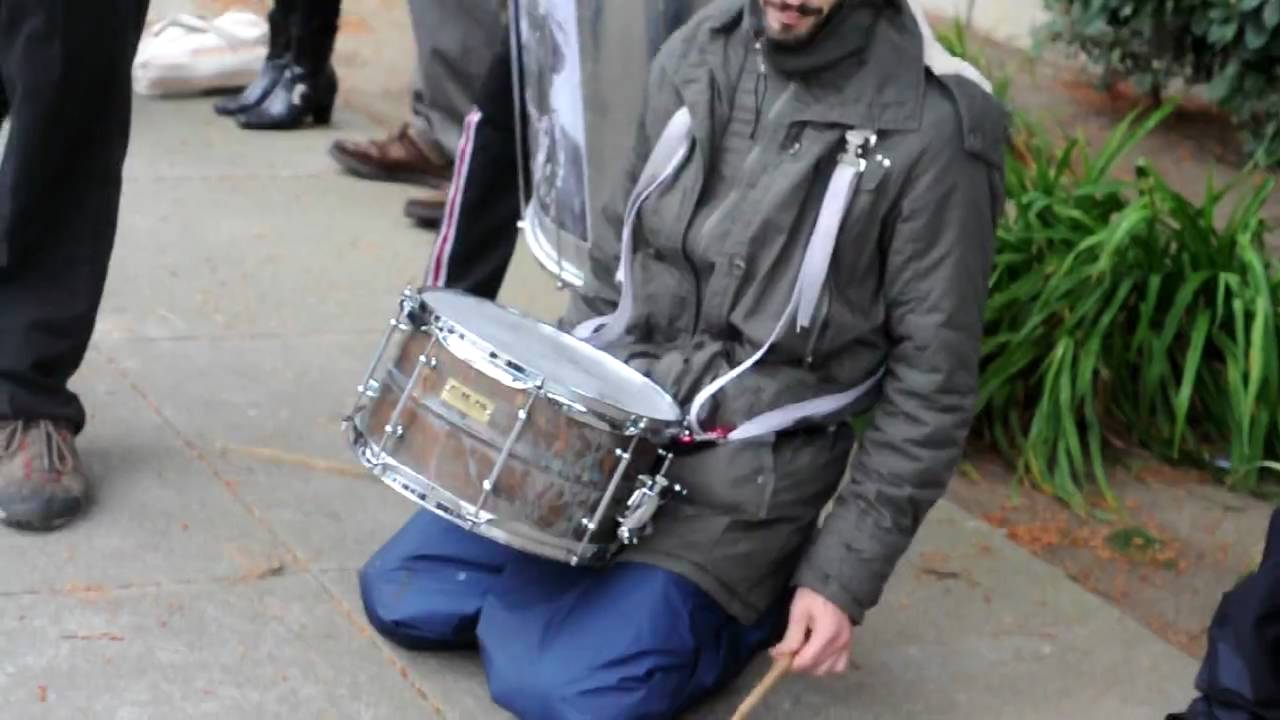 Brass Liberation Orchestra drumming at Homes Not Jails Easter Sunday ...