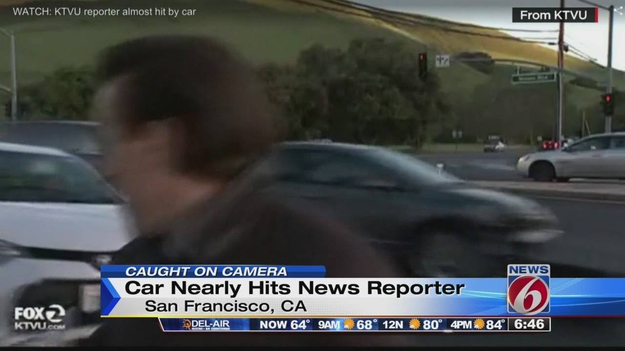 Car nearly hits news reporter - YouTube