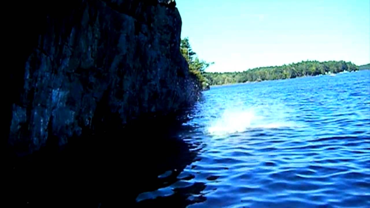 jumping off 50 foot cliff!! - YouTube