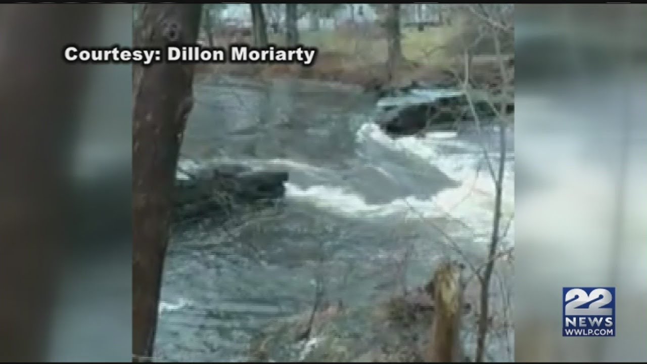 Scantic River Dam breaks, releasing water into nearby area - YouTube