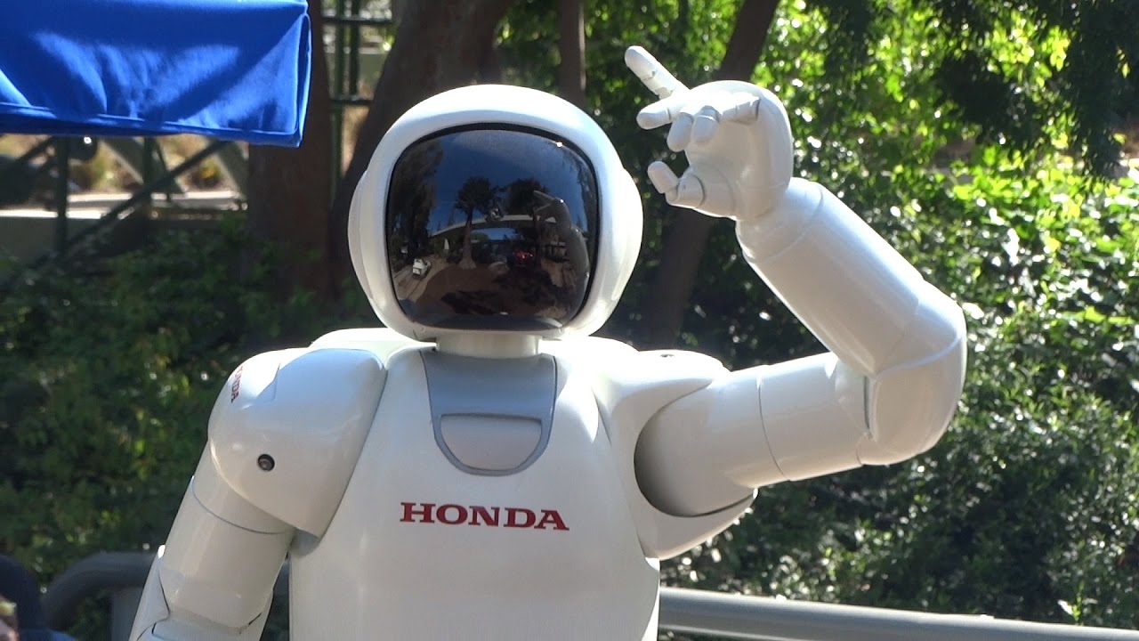 Honda's ASIMO appears in Autopia at Disneyland - YouTube