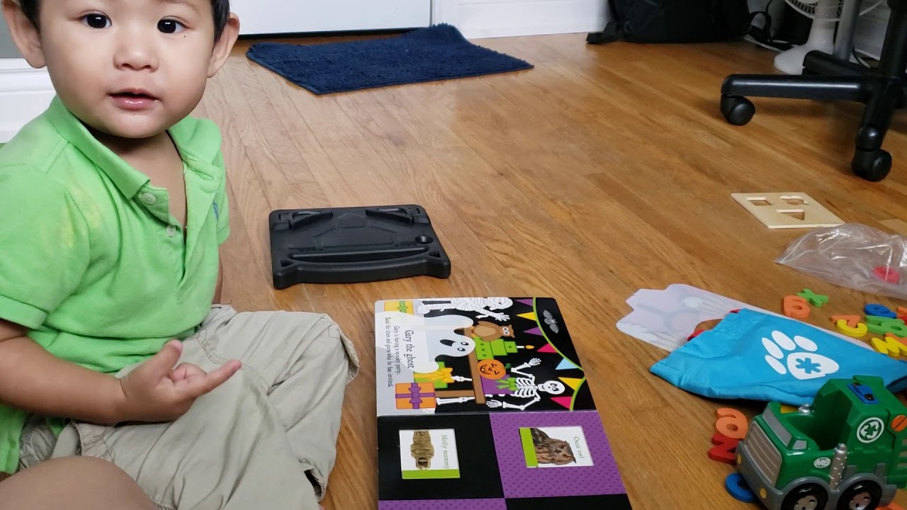 Theo reading spooky book - YouTube