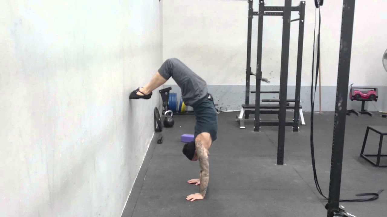 Wall assisted Mexican handstand training - YouTube