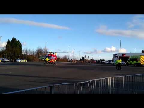 Air ambulance lands at Burnt Tree junction closed due to crash - YouTube