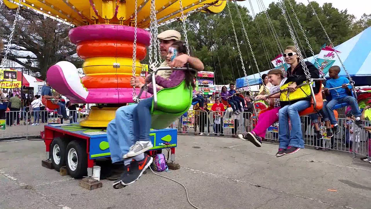 Maddie rides the fair swings - YouTube