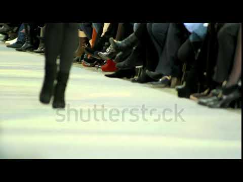 stock footage legs models walking down the catwalk show on the catwalk fashion show blurred silhouet