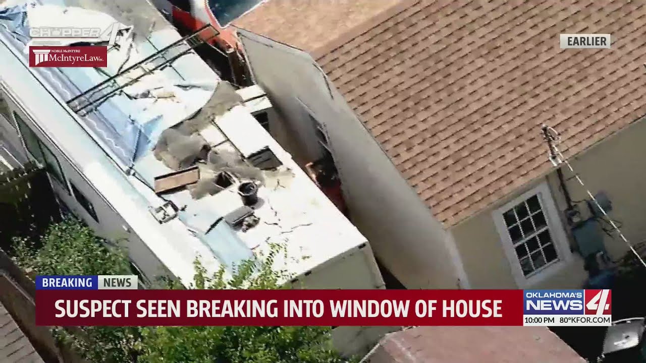 Suspect seen breaking into window of house - YouTube