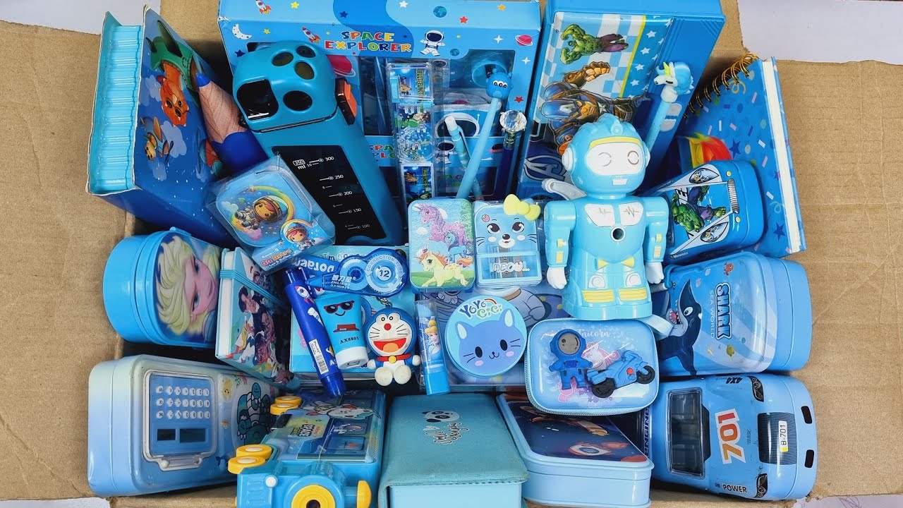 Box full of fancy blue stationery - jumbo pencil sharpner, calculator ...