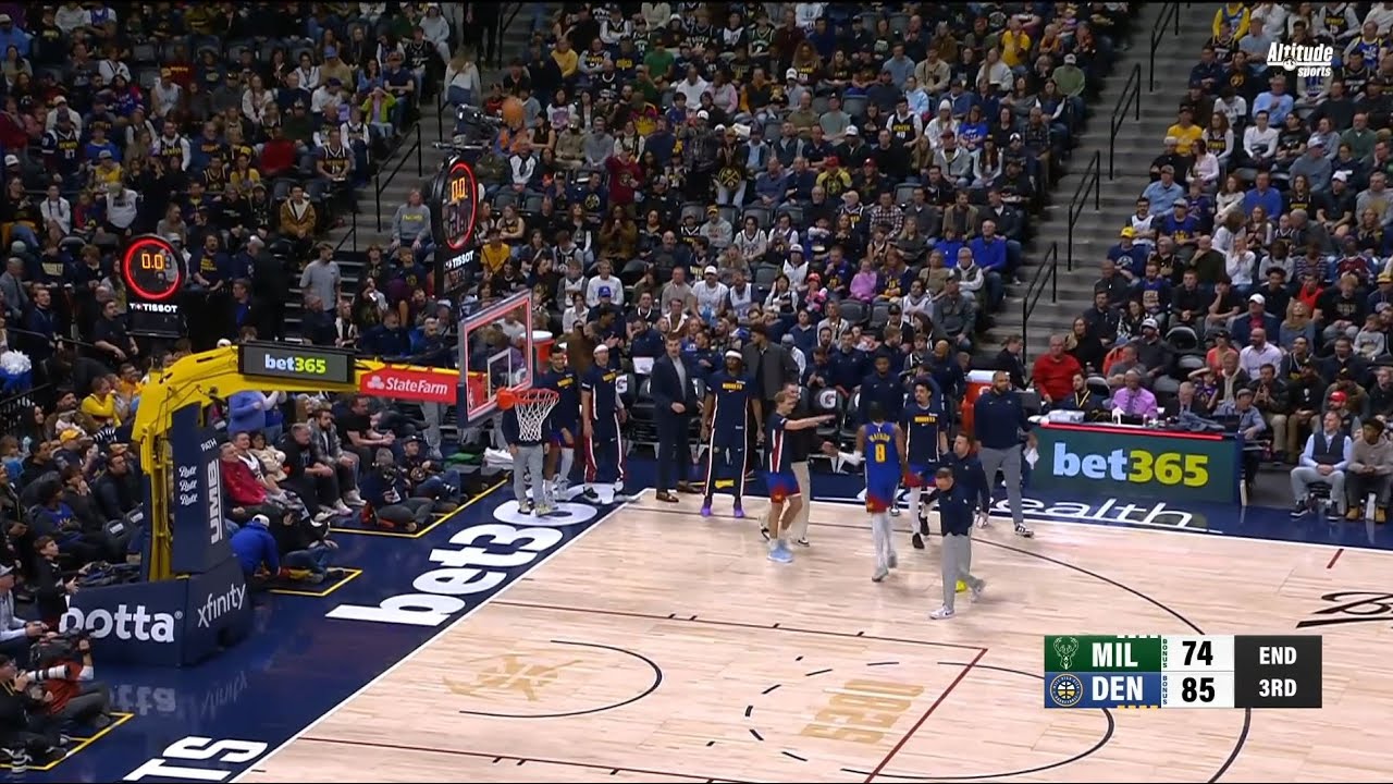 Kyle Kuzma makes a wild 3/4 court shot just after the buzzer - ball ...