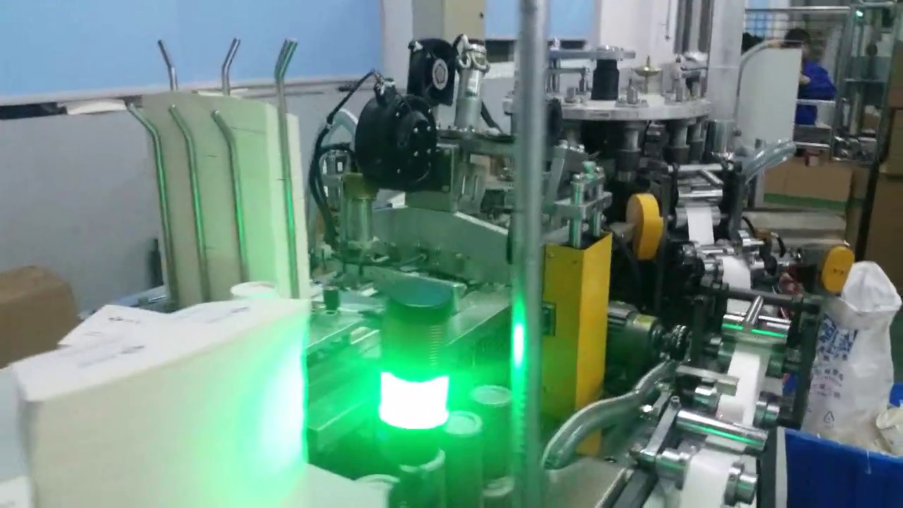 Newtop paper cup machine - YouTube