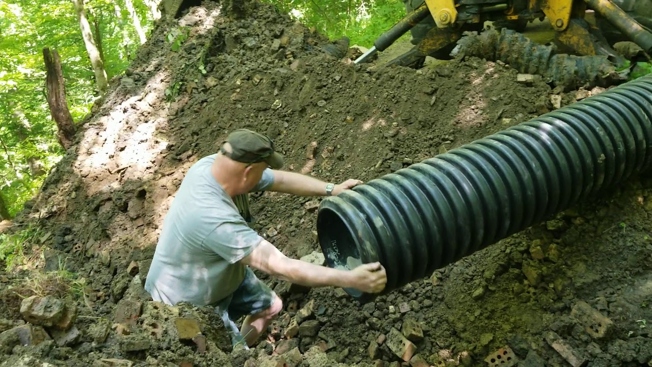 Laying the culvert - YouTube