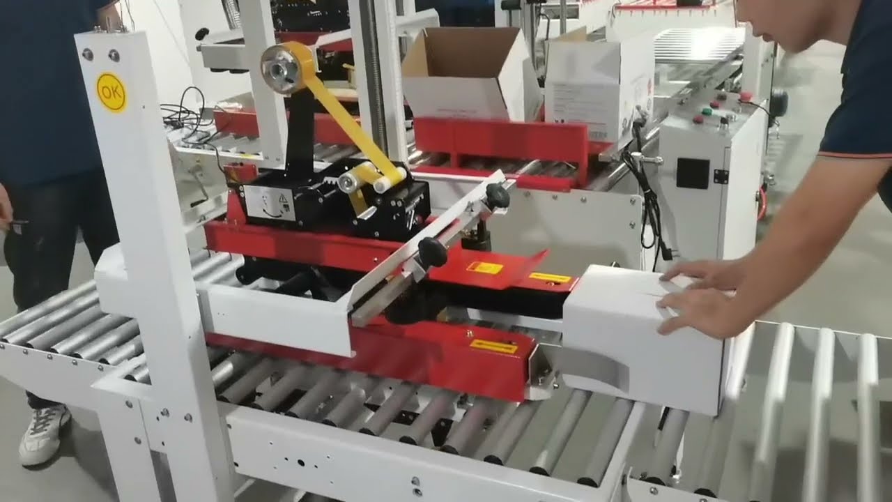 Semi automatic case taping machine - YouTube