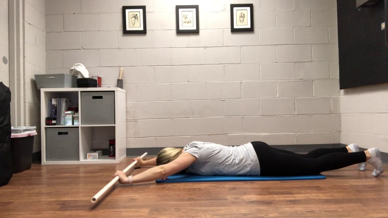 Prone overhead press with PVC pipe - YouTube