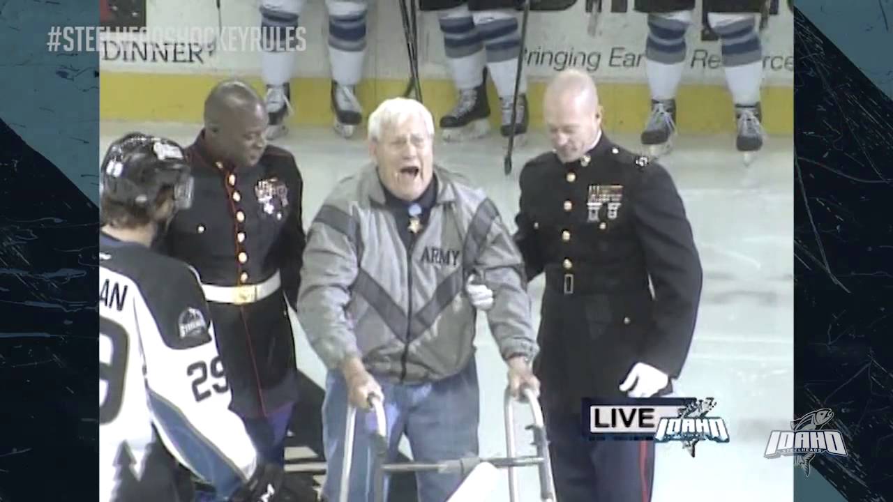 Captain Arthur Jackson drops the first puck - YouTube