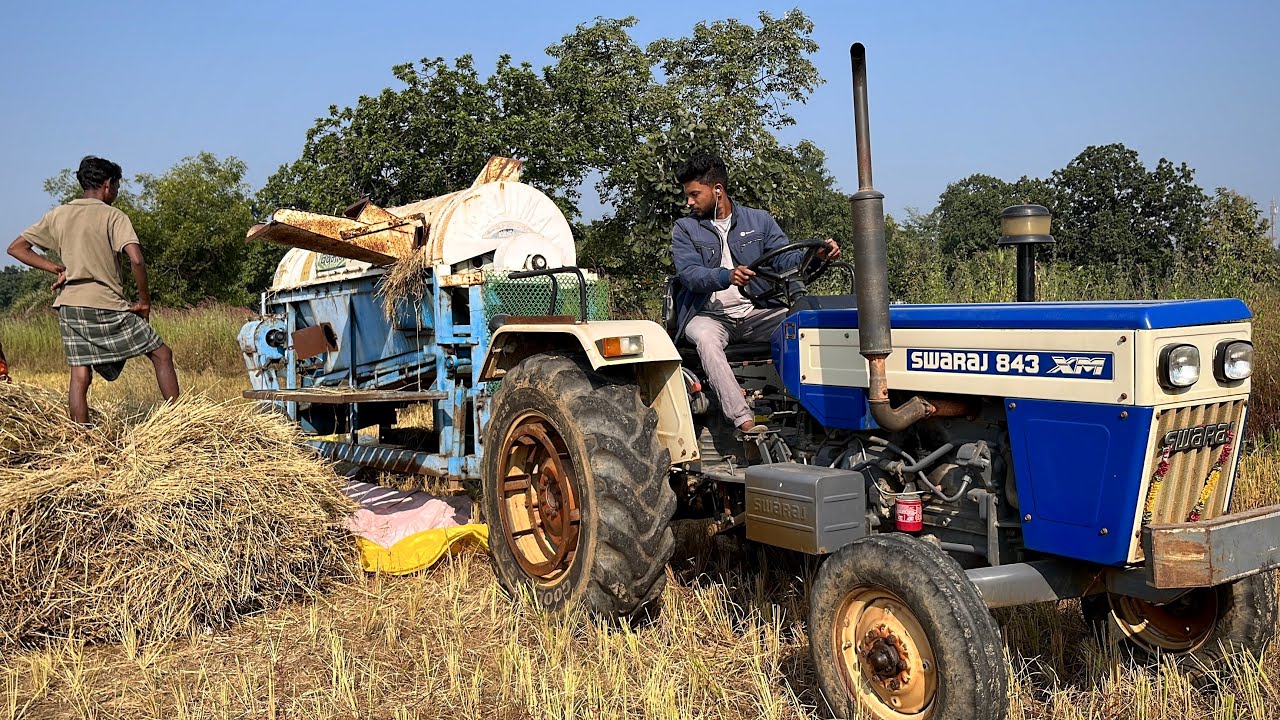 Swaraj 843 XM Tractor Pulling Paddy Thresher For Rice Farming | Tractor ...