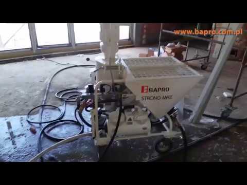 spraying cement lime plaster using plastering machine type BAPRO one ...