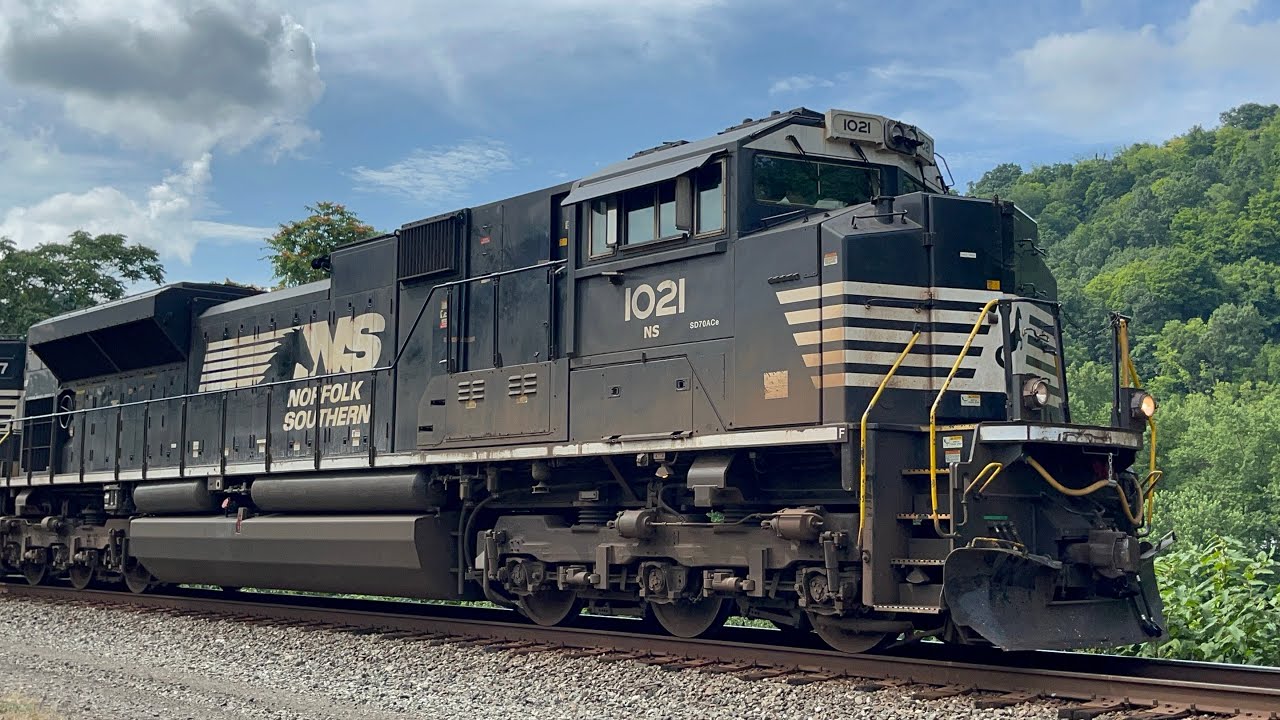 NS SD70ACe 1021 leads a 8 hour late 10G with 4 Units up front and 1068 ...