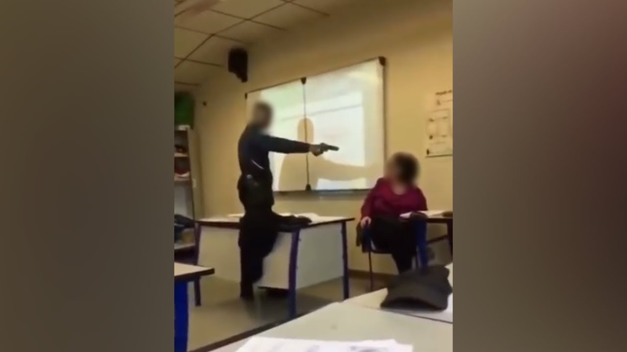 Student points gun at his teacher in classroom - YouTube