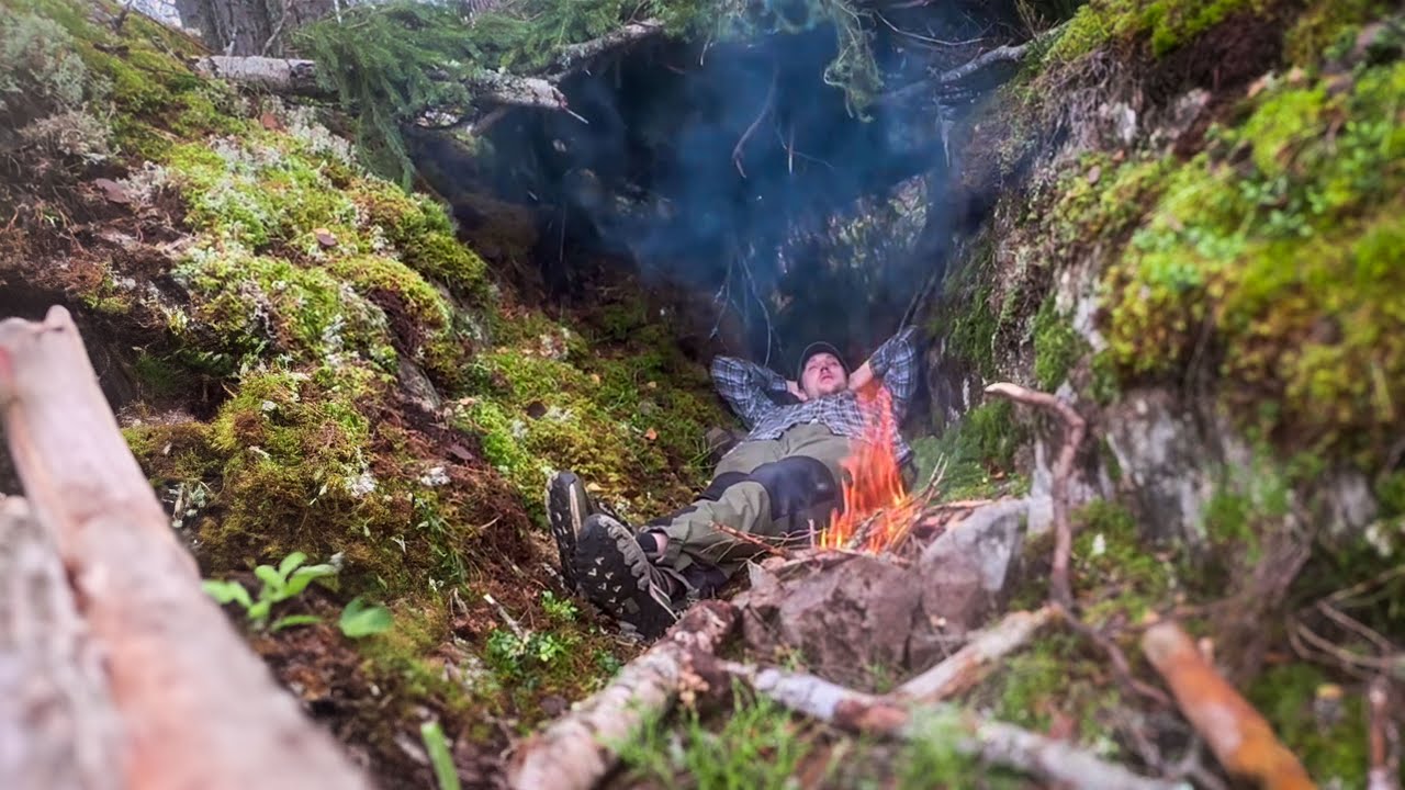 Building a simple Survival Shelter between two Rocks - YouTube