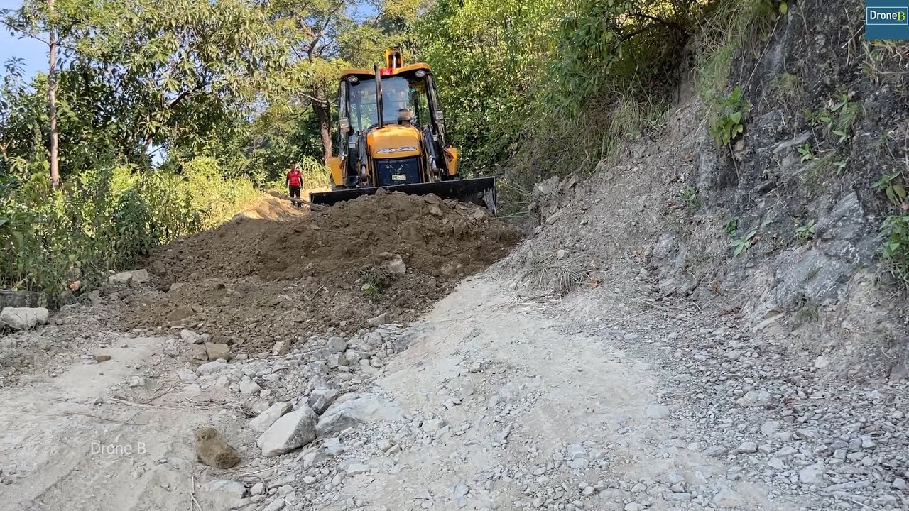 Fixing Bitterly Damaged Mountain Road with JCB Backhoe - YouTube