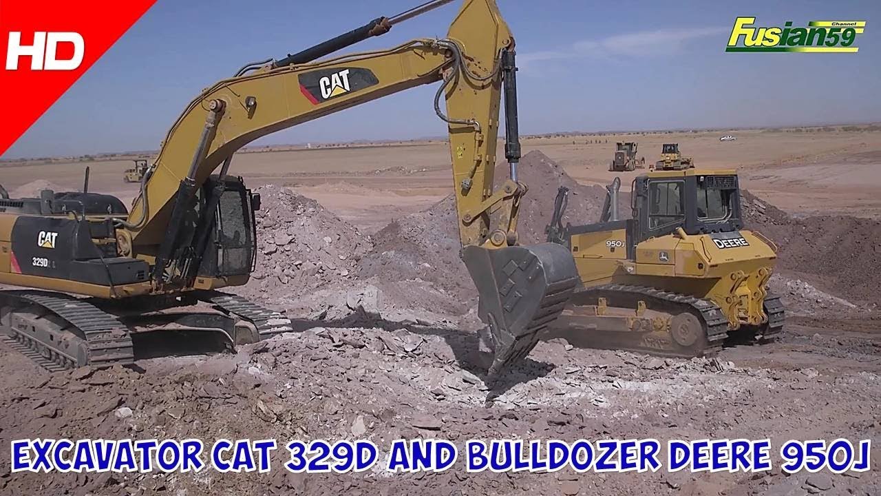 The Cat 329D Excavator and Bulldozer Deere 950J prepare the Nigerien ...