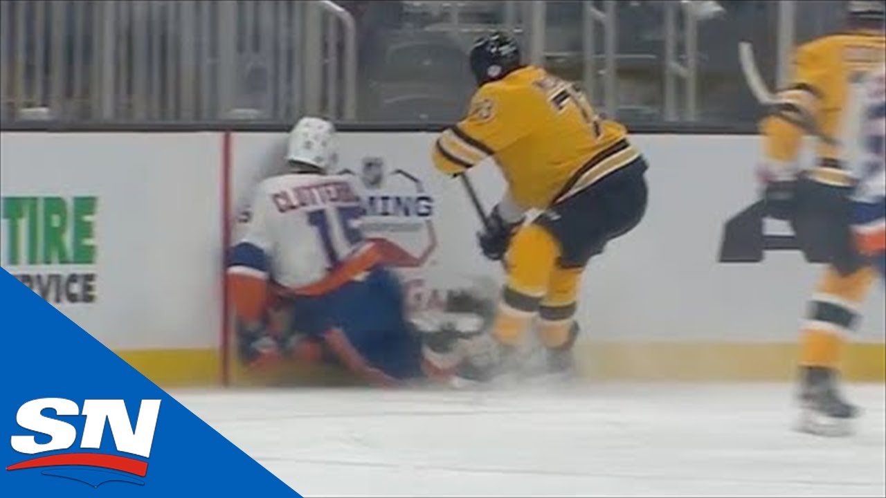 Cal Clutterbuck Goes Hard Into The Boards After Hit From Charlie McAvoy ...