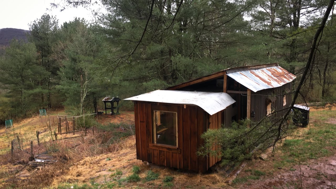 Build a hermitage cabin around an RV / Camper - YouTube