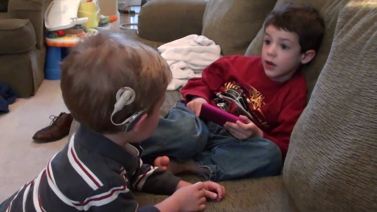 2 year old Eric wearing cochlear implants talks with brother Jake - YouTube