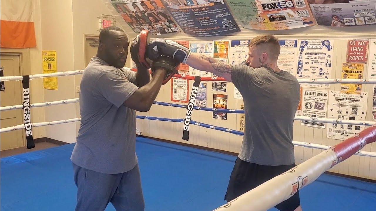 Teaching a MMA fighter how to catch and counter the Left Hook! #boxing ...
