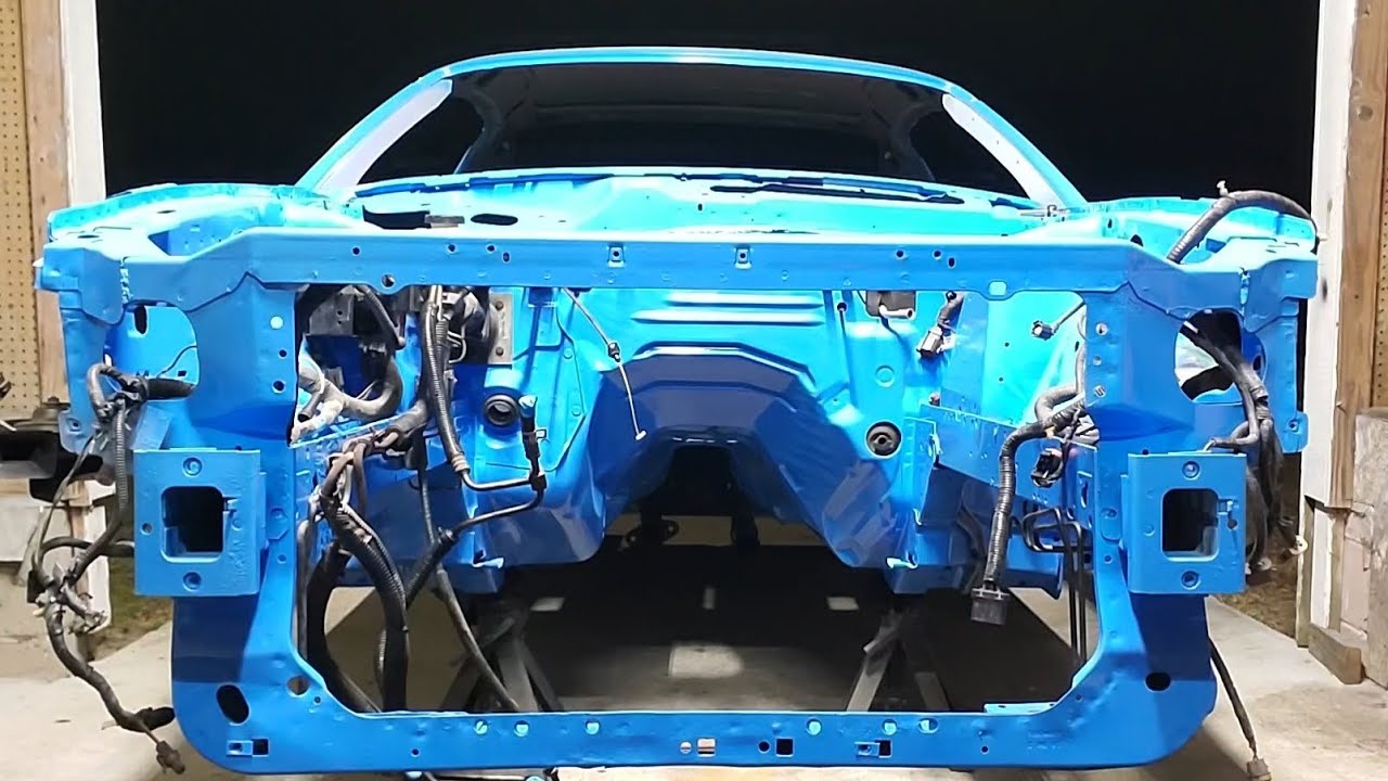 Pulling a mustang engine and transmission by dropping it out the bottom ...