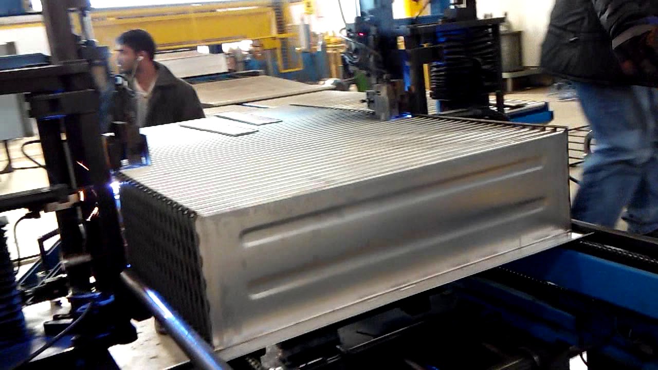 SDRI corrugated tank forming and welding machine 2 - YouTube