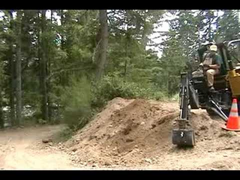 More backhoe Action - YouTube