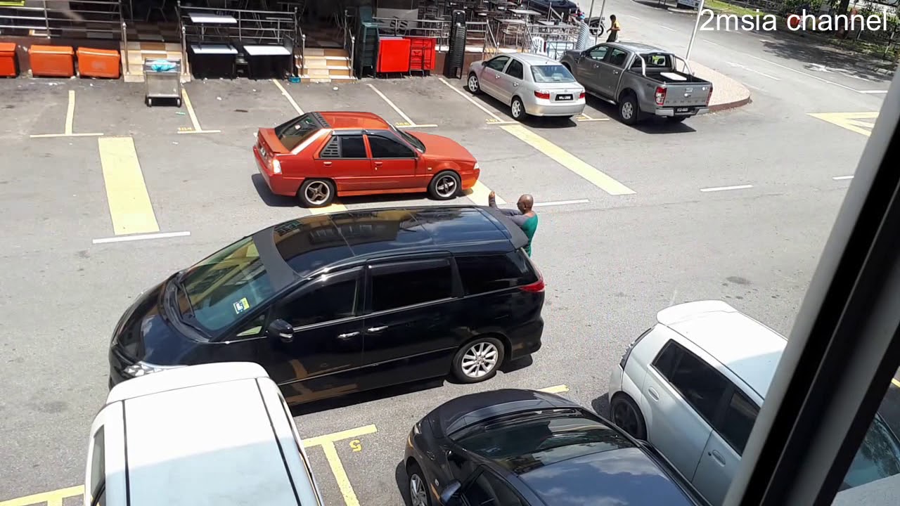 Why Malaysian Double Parking when empty parking is available - YouTube