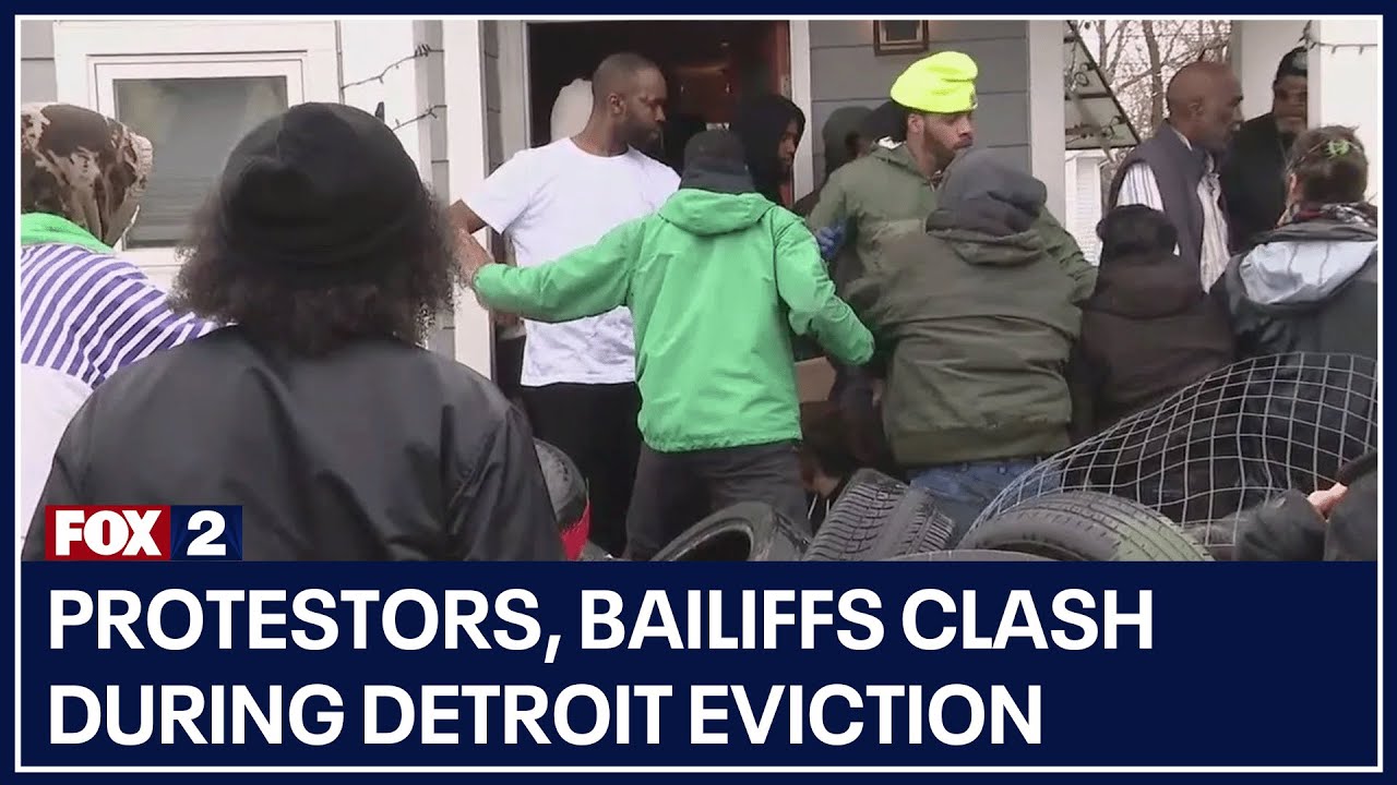 Protestors, bailiffs clash during Detroit eviction - YouTube