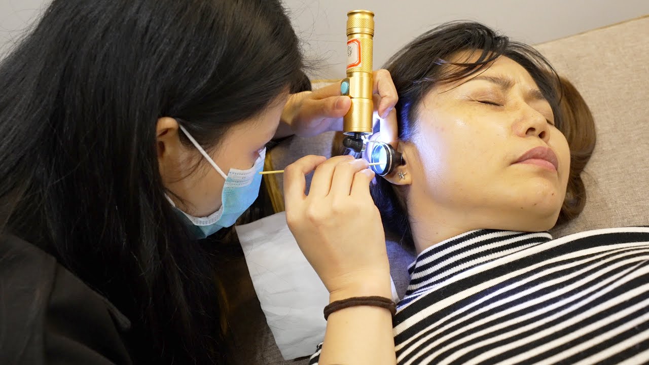 Experience the process of ear massage for $6 in China。comfortable to ...