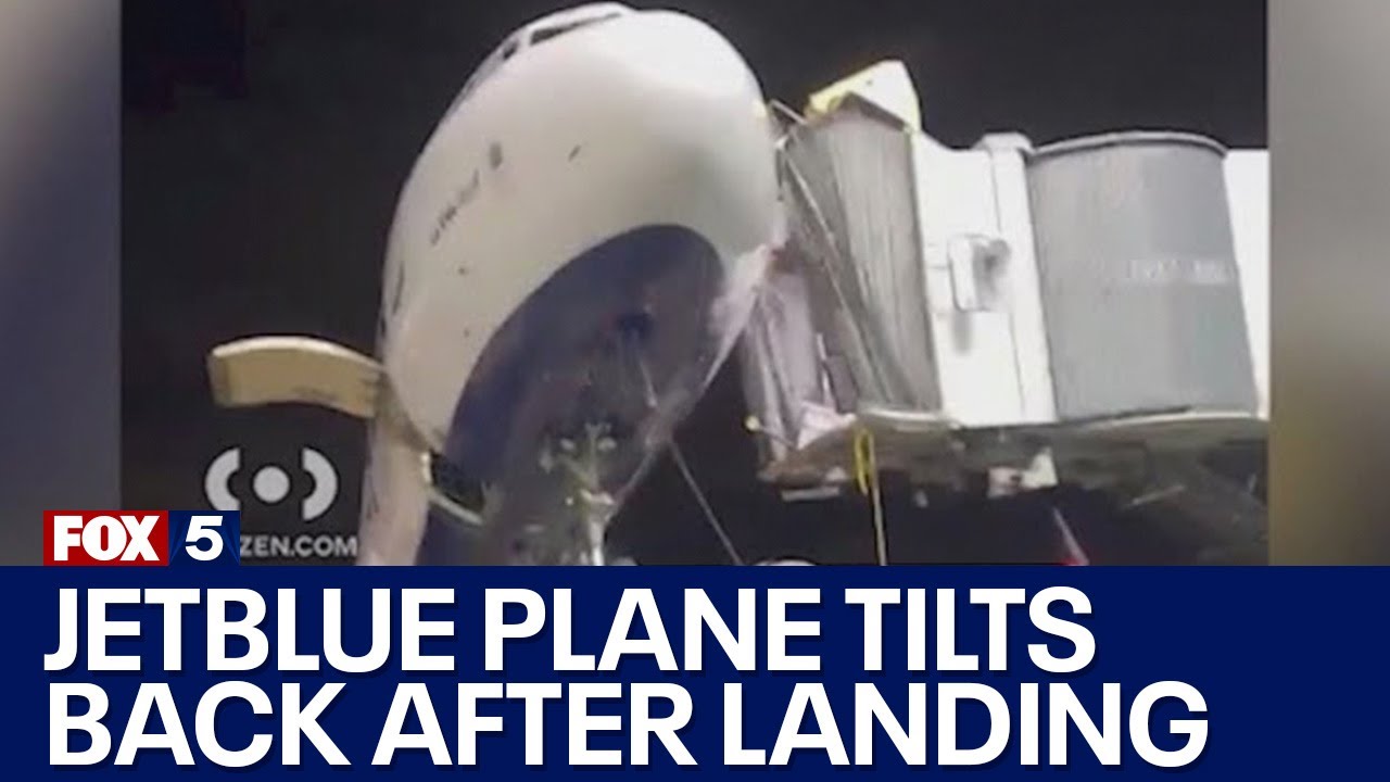 JetBlue plane tilts back after landing at JFK Airport - YouTube