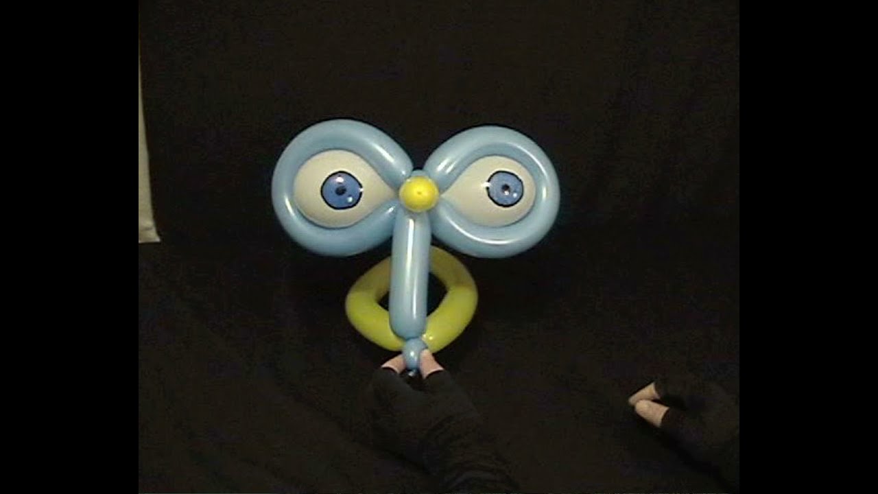 Learn how to make a balloon animal double eyeball hat - YouTube
